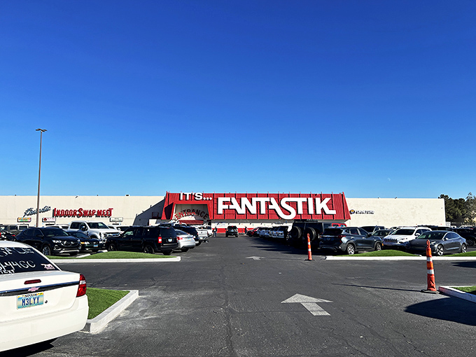 Welcome to bargain paradise! The Fantastic Indoor Swap Meet's vibrant exterior promises a treasure trove of deals inside, like a Vegas casino for thrifty adventurers.