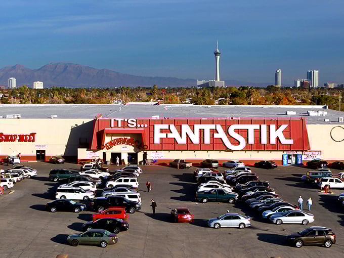 Welcome to bargain paradise! The Fantastic Indoor Swap Meet's vibrant exterior promises a treasure trove of deals inside, like a Vegas casino for thrifty adventurers.