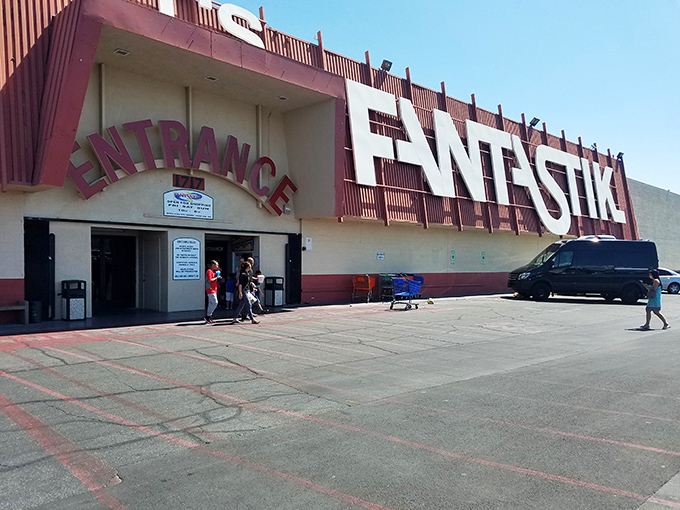 Welcome to bargain paradise! The Fantastic Indoor Swap Meet's vibrant exterior promises a treasure trove of deals inside, like a Vegas casino for thrifty adventurers.