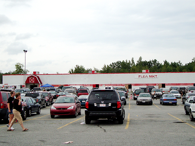 Welcome to bargain hunter's paradise! The Salem NH Flea Market Inc stretches as far as the eye can see, with colorful tents and a packed parking lot promising treasures galore for eager shoppers.
