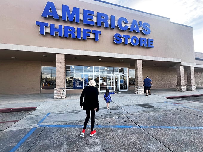 
Welcome to the mothership of secondhand treasures! America's Thrift Store beckons bargain hunters with its bold blue sign, promising adventures in every aisle.