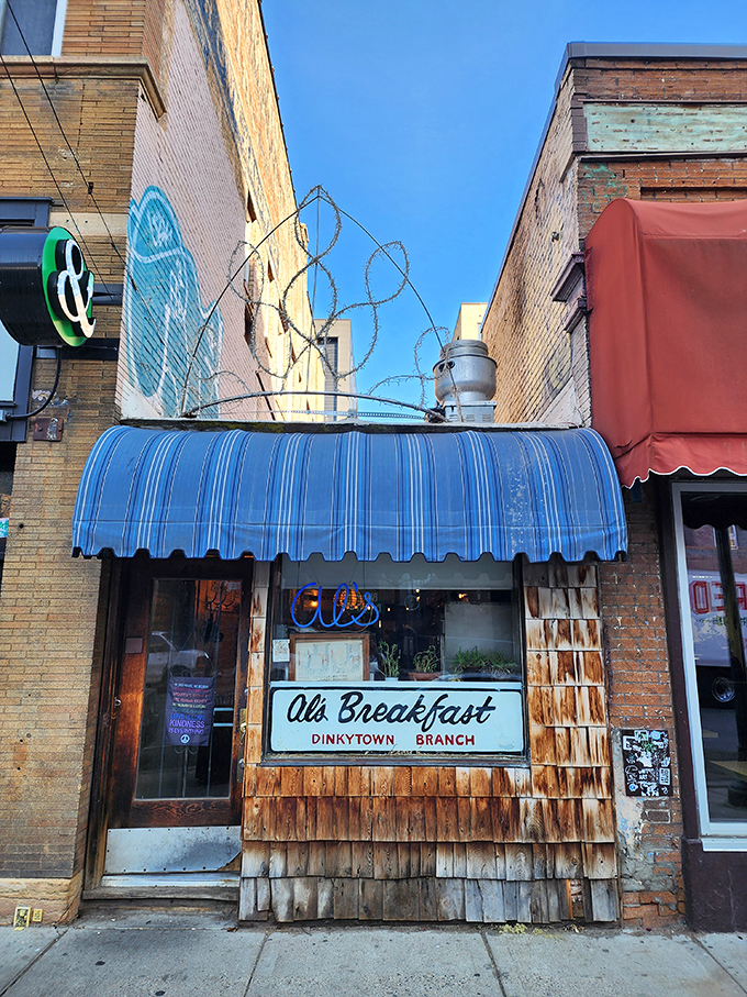 Welcome to Al's Breakfast, where the awning is as blue as the Minnesota sky and the promise of pancakes is just as vast!