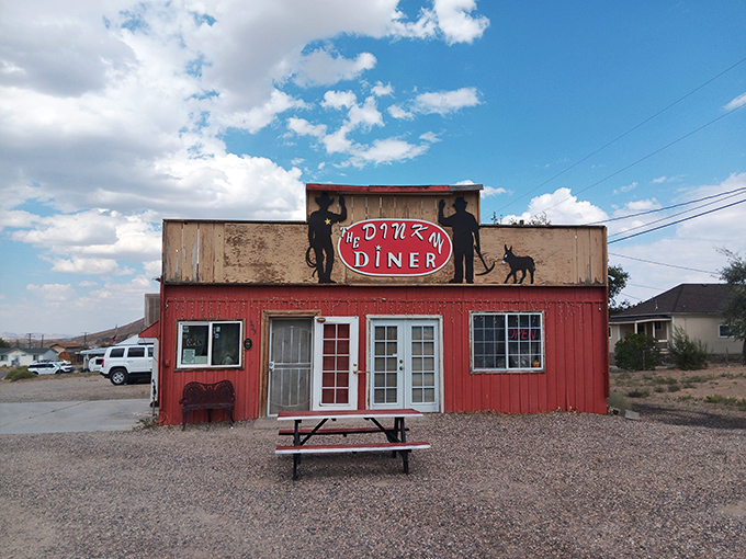 Welcome to the Dinky Diner, where big flavors come in small packages! This charming red exterior is like a beacon of comfort food in the Nevada desert.