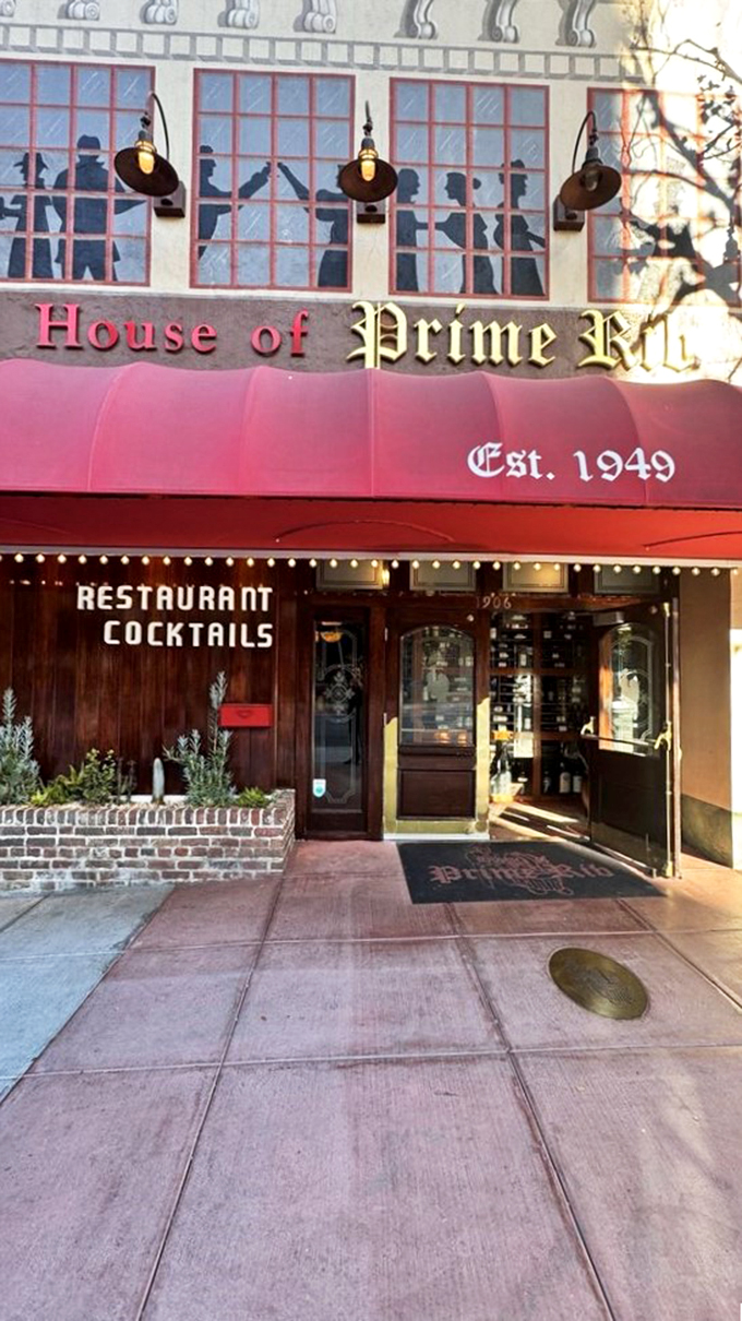 A red carpet welcome for your taste buds! This iconic facade promises a journey into prime rib paradise, where meat dreams come true and diets go to die.