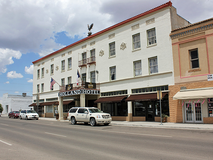 Welcome to Alpine, where the Holland Hotel stands like a sentinel guarding the town's history. This isn't just a place to rest your head&mdash;it's a time machine with room service!
