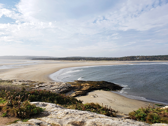 Who needs a postcard when you've got this view? Popham Beach State Park serves up a slice of Maine paradise, complete with picturesque houses and a serene lake that's bluer than a lobster's mood ring.