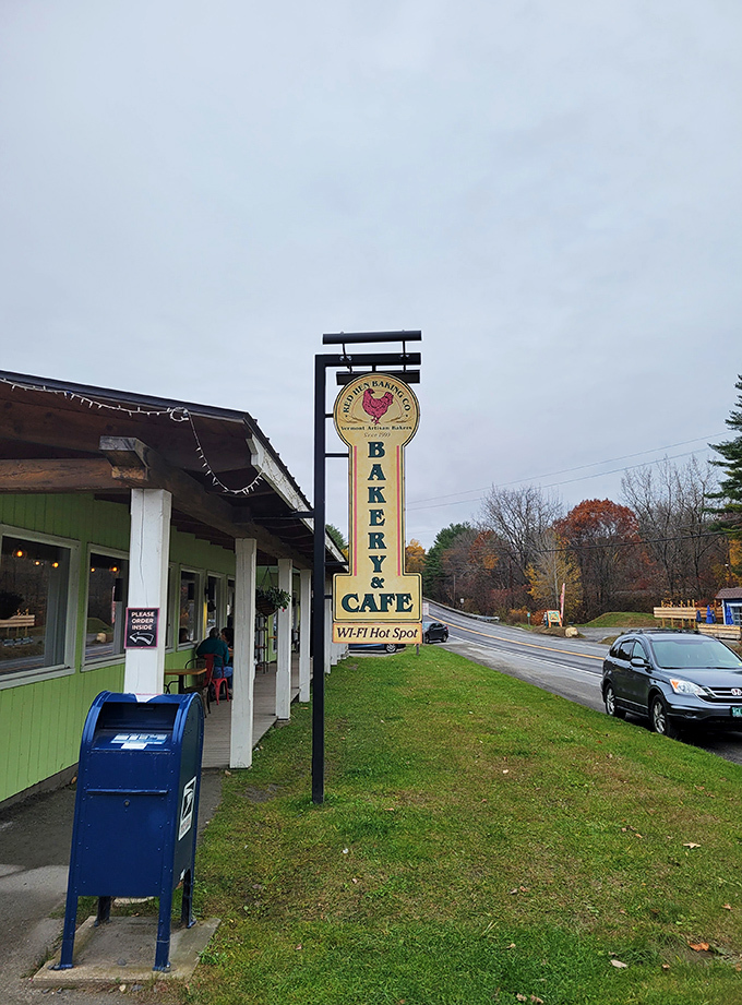 A green oasis of carb-laden delights! Red Hen Baking's charming exterior promises a feast for the senses, with its quaint sign beckoning hungry travelers like a lighthouse for the famished.