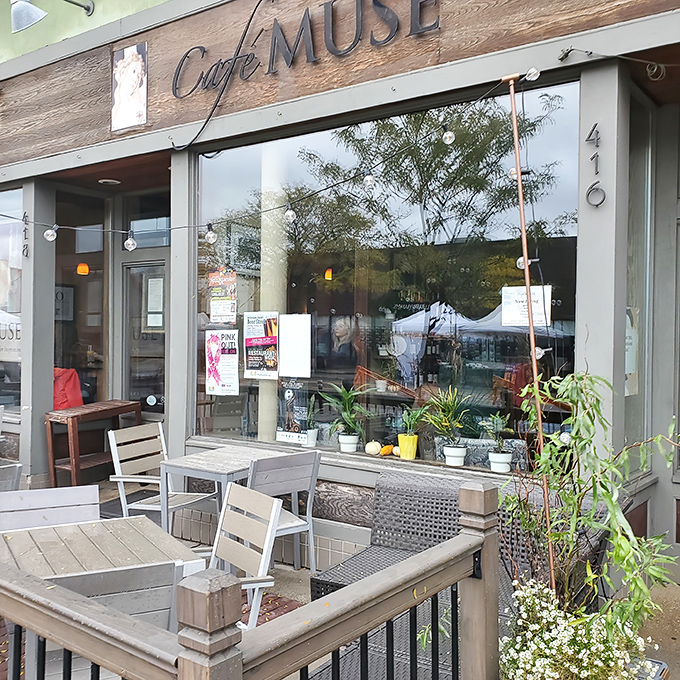 Welcome to cheese paradise! Caf&eacute; Muse's charming exterior promises a cozy retreat where culinary dreams come true.