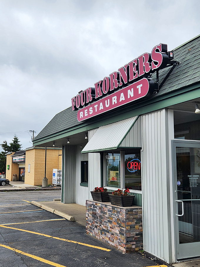Welcome to Four Korners, where the sign promises good eats. This unassuming exterior hides a treasure trove of comfort food delights!