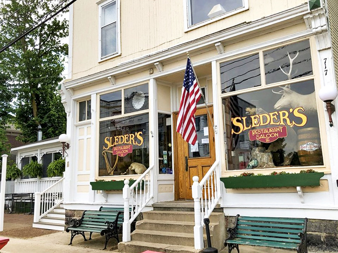 Step back in time! Sleder's Family Tavern stands proud, its white facade and wraparound porch whispering tales of bygone eras. A slice of Americana, served with a side of nostalgia.