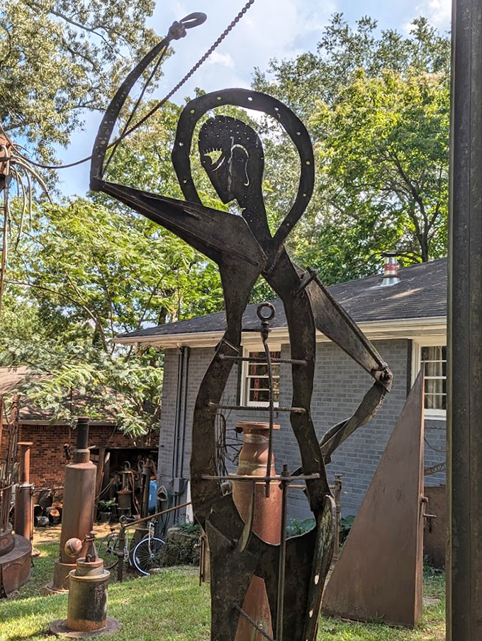 Welcome to the land of metal and magic! This rusty sentinel stands guard, a whimsical greeter with a skull that's all smiles.