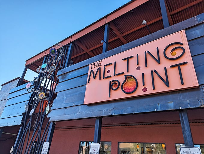 Welcome to The Melting Point, where the exterior is as hot as the furnaces inside! This rustic-chic facade houses a world of glass-blowing wonders.
