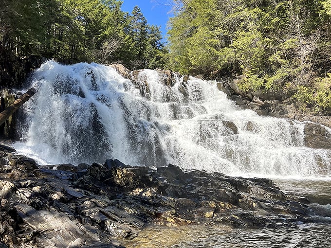 Nature's own water park! Houston Brook Falls cascades down 32 feet of rocky terrain, creating a spectacle that'll make your Instagram followers green with envy.
