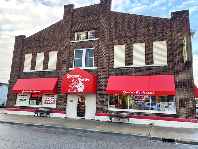 A beacon of baked bliss! Goodale's red awnings beckon like a culinary lighthouse, guiding hungry souls to a haven of homemade pasties and sweet treats.