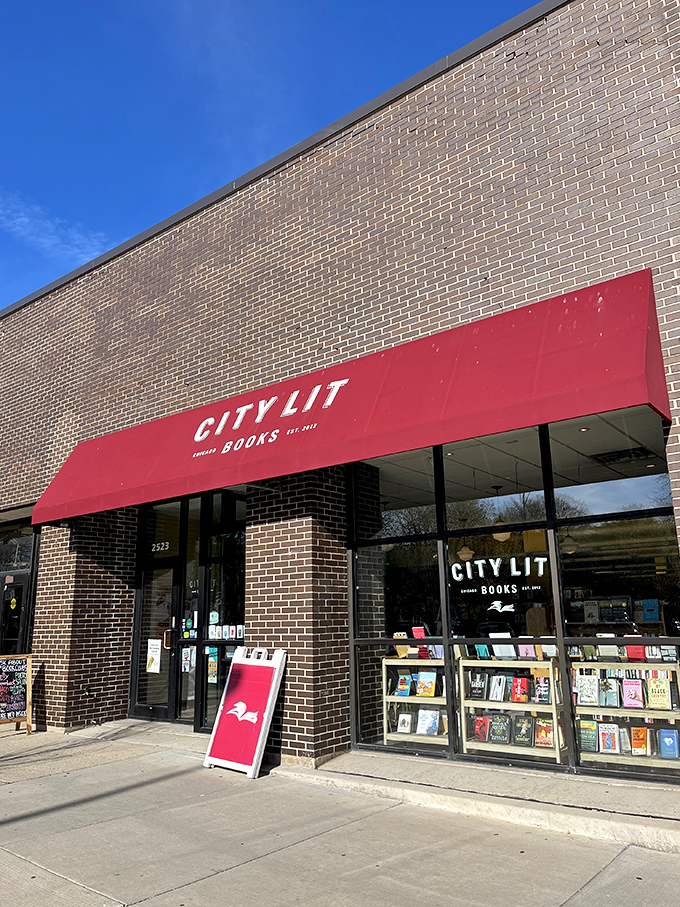 "Welcome to the literary oasis! City Lit Books stands proud, its red awning a beacon for bibliophiles. It's like a candy store for your brain, minus the sugar crash."