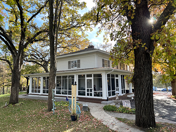 A storybook come to life! This charming white house in Anoka isn't just a pretty facade - it's the gateway to a wonderland of whimsy and delectable treats.