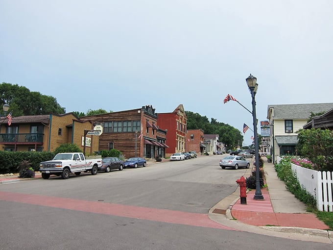 Trempealeau: Where small-town charm meets big river views. This shot captures the essence of riverside living, complete with a lively gathering that would make Norman Rockwell reach for his paintbrush.