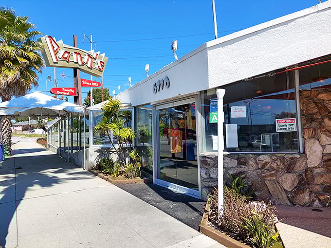 Welcome to Pann's, where the 1950s never left and your arteries are in for a wild ride! This Googie-style gem has been serving up nostalgia with a side of bacon since Eisenhower was in office.