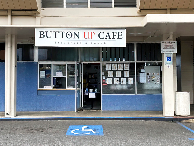 Welcome to breakfast paradise! Button Up Cafe's cheery blue exterior promises a feast for the senses inside.