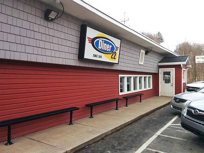 Welcome to flavor town! This cozy red exterior isn't just a diner, it's a portal to comfort food paradise. 