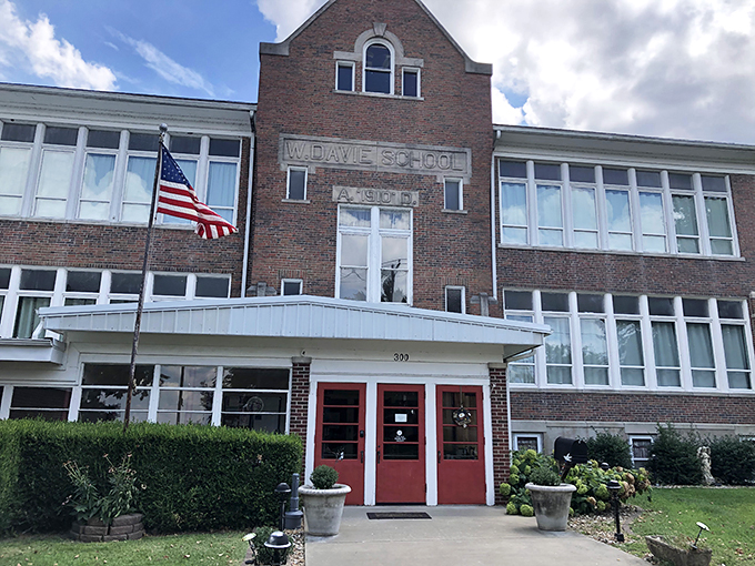 Welcome to school, where naps are encouraged! This charming brick edifice, once filled with chalk dust and daydreams, now invites you to slumber in style.