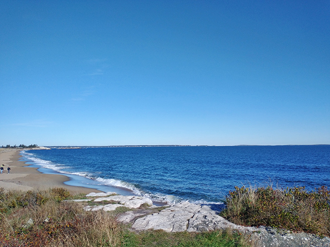Nature's own IMAX: Reid State Park's Mile Beach stretches out like a golden carpet, inviting you to star in your own coastal blockbuster.