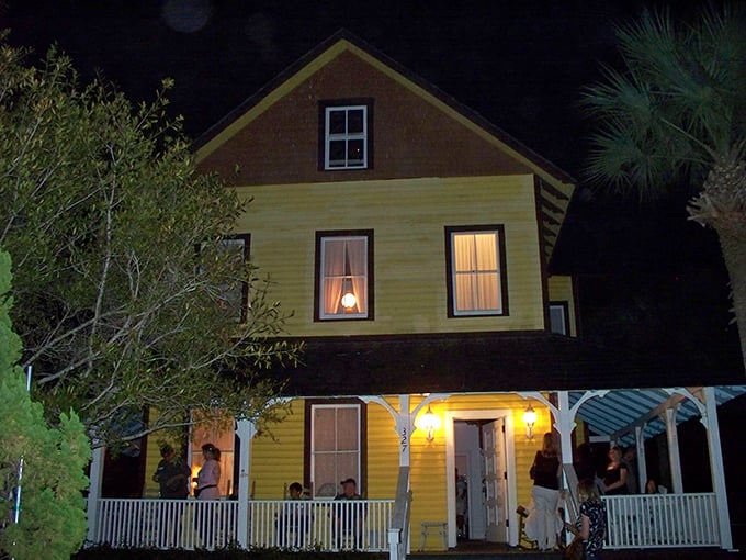 Sunshine by day, spooky by night! This cheery yellow Victorian holds more secrets than your grandma's recipe box.