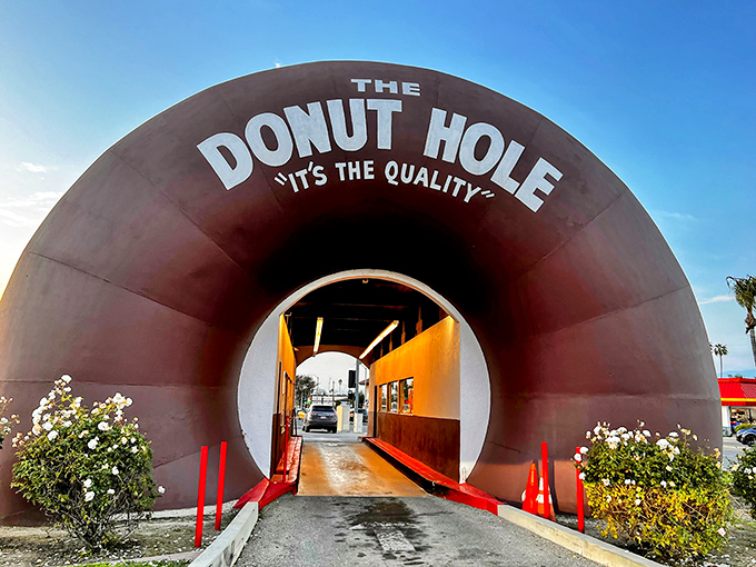 Welcome to donut paradise! The Donut Hole's iconic brown arches invite you to drive through a sugary wonderland that's sweeter than your average commute.
