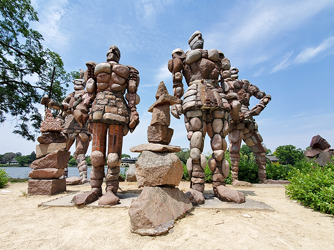 "Rock stars of a different kind! These colossal stone figures stand guard over Rockford's riverbank, striking poses that would make Michelangelo jealous."