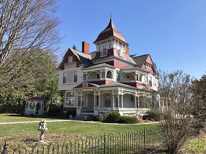 Welcome to the Grand Victorian, where time travel comes with complimentary Wi-Fi! This architectural confection looks ready to host a Downton Abbey garden party or your next Instagram photoshoot.