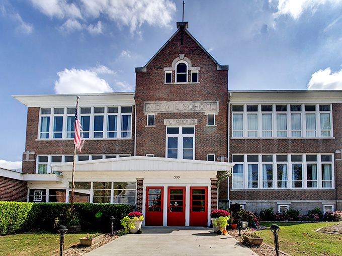 Welcome to school, where naps are encouraged! This charming brick edifice, once filled with chalk dust and daydreams, now invites you to slumber in style.
