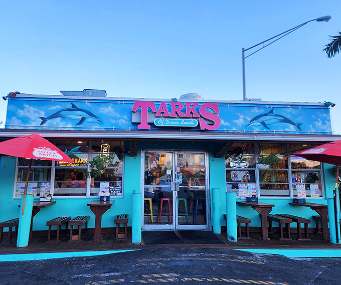 Welcome to seafood paradise! Tarks of Dania Beach stands proud, its aqua exterior as inviting as a cool ocean breeze on a hot Florida day.