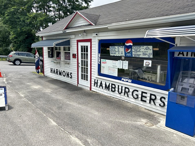 A time capsule with a side of fries! Harmon's Lunch stands proudly, its white clapboard exterior whispering tales of burgers past and onion rings to come.