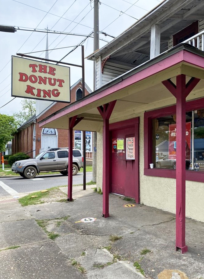 A beacon of sugary hope! The Donut King's unassuming exterior belies the sweet treasures within, like a culinary TARDIS for your taste buds.