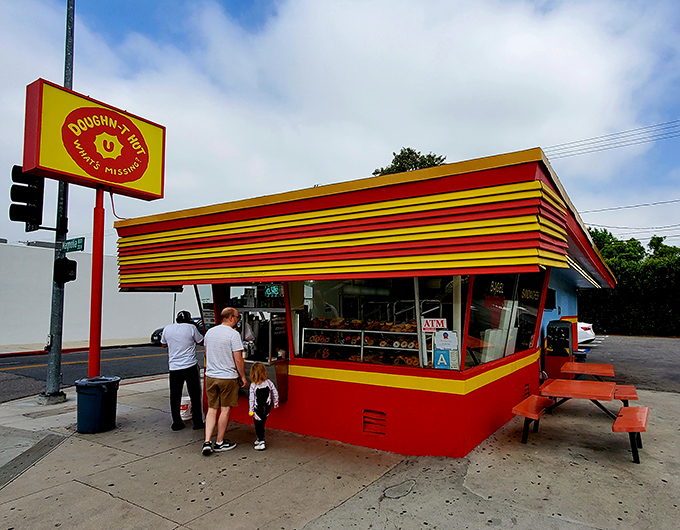 A retro rainbow in the heart of Burbank! Donut Hut's exterior is like a time machine, whisking you back to simpler, sweeter days.