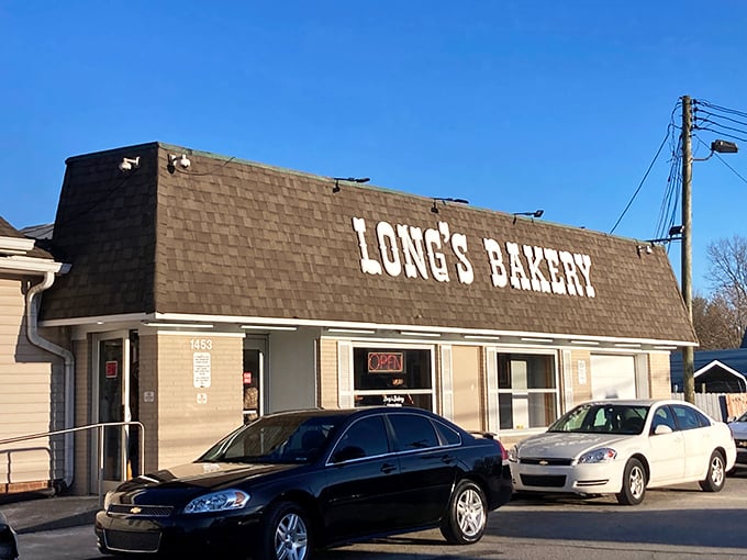 Welcome to donut paradise! Long's Bakery stands proud, its no-frills exterior promising sweet delights within. It's like the Clark Kent of bakeries - unassuming, but hiding superpowers.