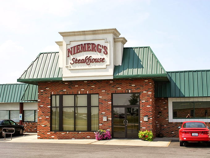 Welcome to beef paradise! Niemerg's Steakhouse stands proud, its green roof a beacon for hungry travelers and locals alike.