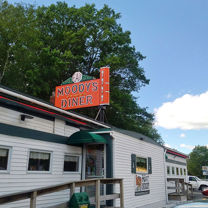 A beacon of comfort food! Moody's iconic orange sign promises a journey back in time, with a side of nostalgia and gravy.