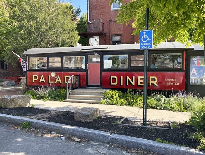 Step right up, folks! This isn't just a diner; it's a time machine disguised as a vintage railcar. All aboard for flavor!