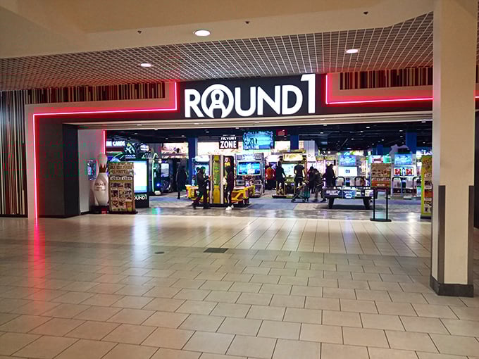 "Welcome to the mothership of fun! Round1's exterior promises a world of excitement, with that giant bowling pin standing guard like a whimsical sentinel."