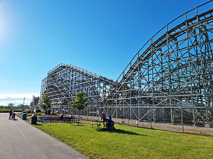 Wooden wonder reaching for the sky! The Zippin Pippin's twists and turns promise a thrill ride that'll make your heart race faster than a Packers touchdown.