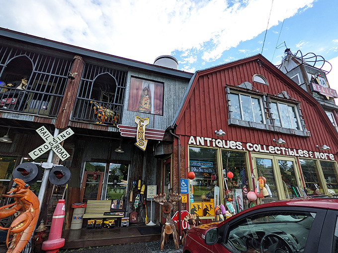 A whimsical wonderland awaits! This red barn-meets-Victorian mansion looks like it was designed by Dr. Seuss after a lobster bake.