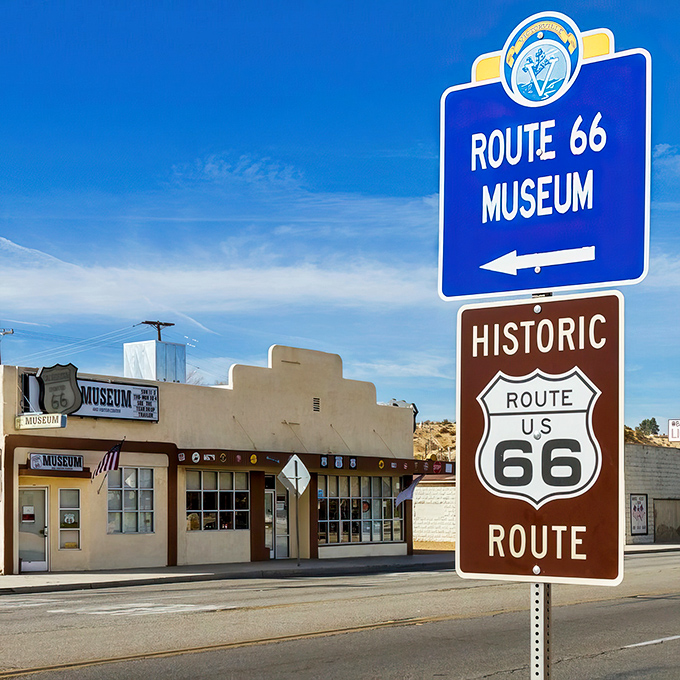 Welcome to the Mother Road's memory lane! This vibrant sign beckons travelers to a time capsule of Americana, where neon dreams and chrome fantasies come alive.