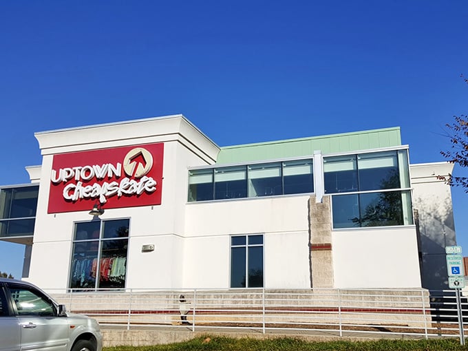 Welcome to fashion paradise! Uptown Cheapskate's bold red sign beckons bargain hunters like a siren call to stylish sailors.