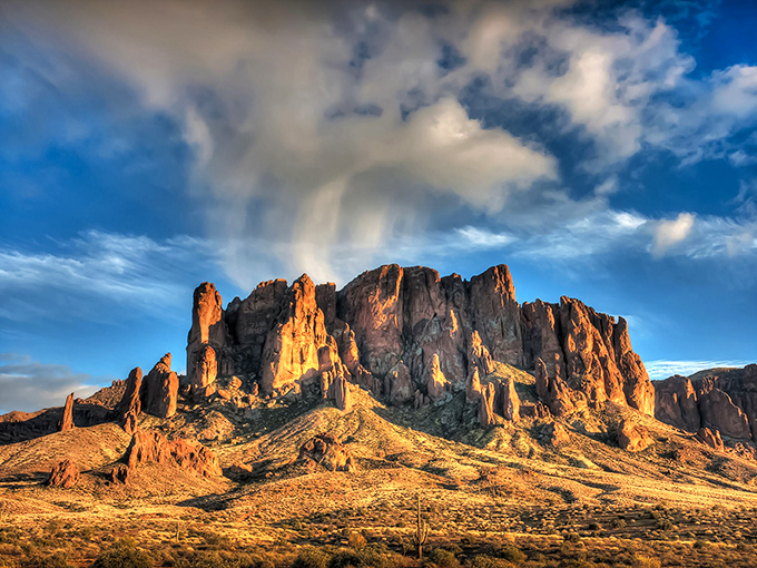 Nature's skyscraper! The Superstition Mountains rise like a majestic fortress, daring adventurers to uncover their secrets. Indiana Jones, eat your heart out!