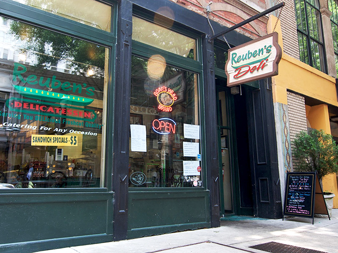 Welcome to sandwich paradise! Reuben's Deli's classic storefront promises a journey through flavor town, with a side of Atlanta charm.