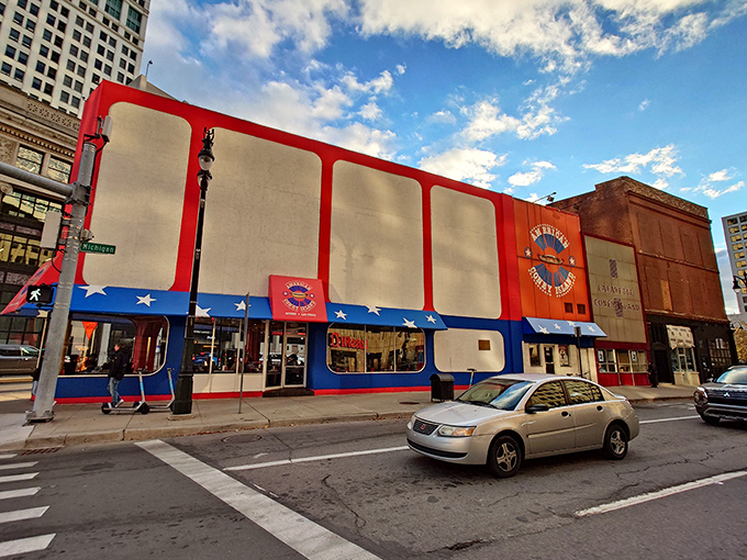 A splash of red, white, and blue beckons hungry patrons. Lafayette Coney Island's exterior is like a patriotic beacon for hot dog lovers.
