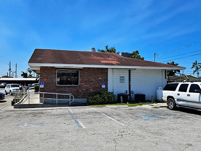 Welcome to chicken paradise! Dixie Fried Chicken's unassuming exterior hides a world of crispy, juicy delights. It's like finding the Holy Grail of comfort food in Belle Glade.