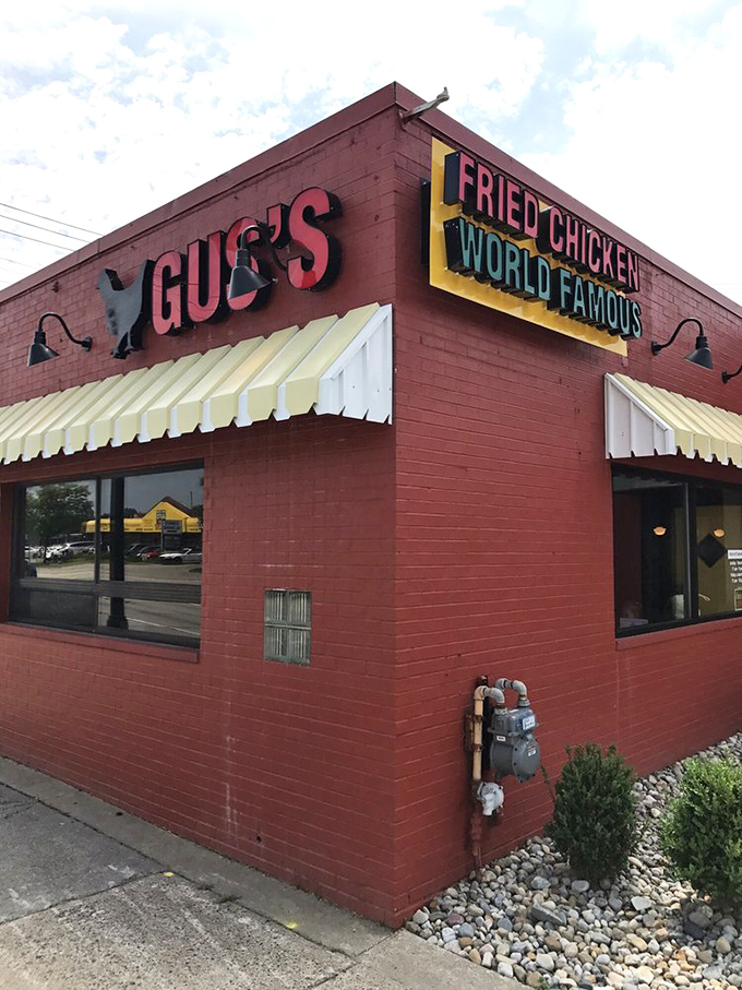 A red-brick beacon of flavor! Gus's exterior promises a no-frills experience that's all about the chicken. It's like the Fort Knox of fried poultry &ndash; plain outside, but pure gold within.