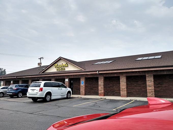 Welcome to pizza paradise! Marion's Piazza stands proud, its yellow sign a beacon of cheesy goodness in the Ohio landscape.
